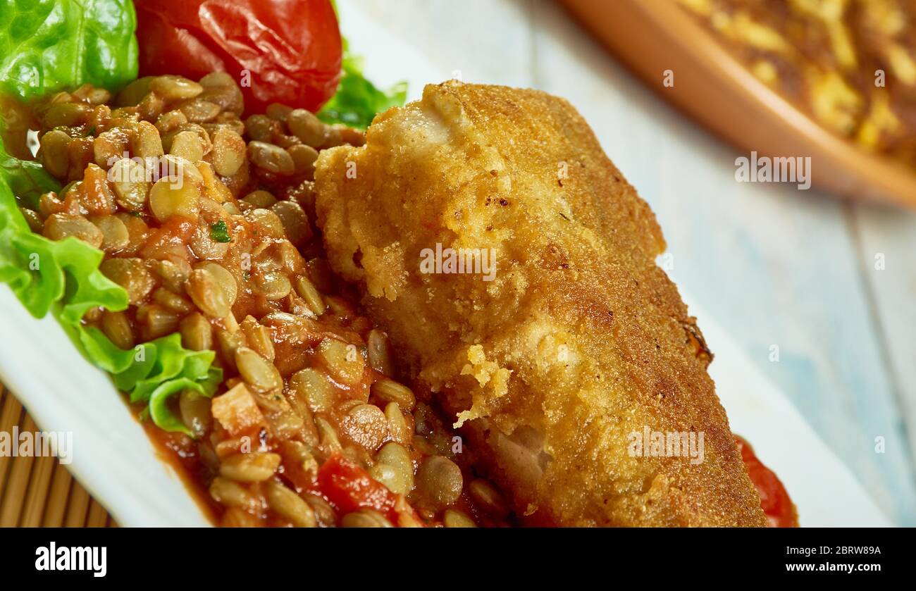 Harissa crumbed fish with lentils, prepare mid-week meal Stock Photo ...