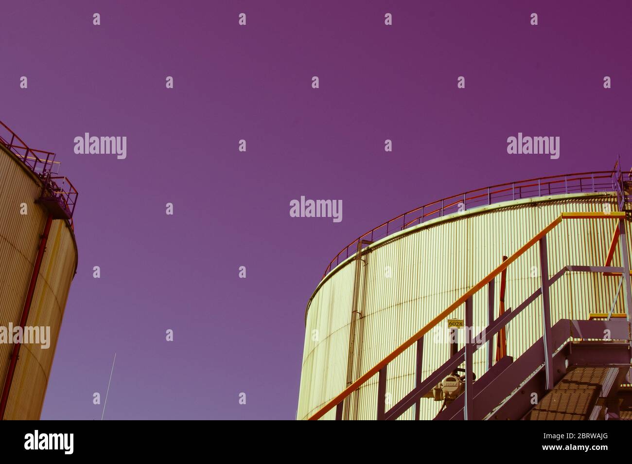 Crude oil tank in the oil refinery. Storage tanks for oil. Tanks for ...