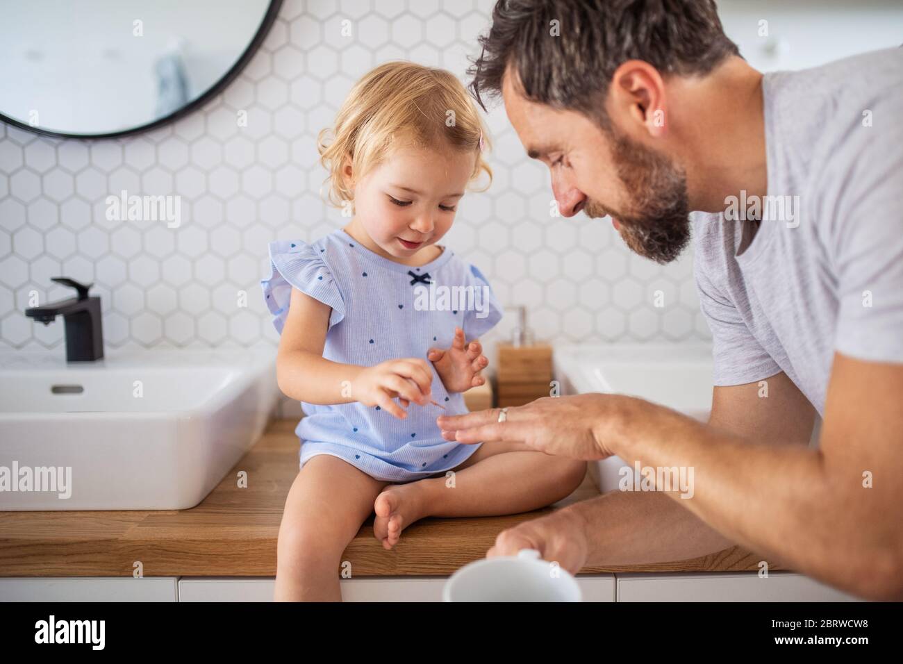 Blond man bathroom hi-res stock photography and images - Alamy