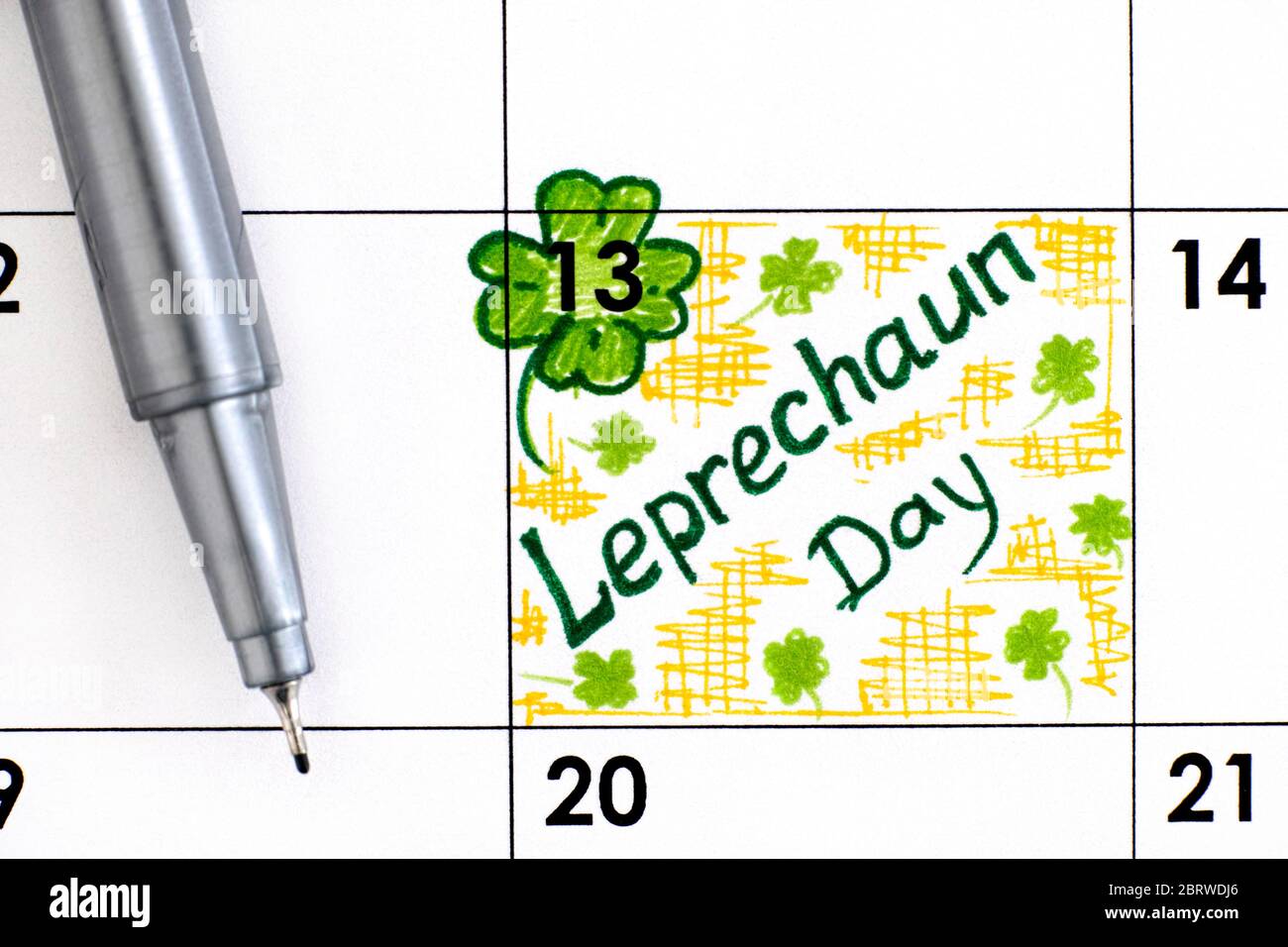 Reminder Leprechaun Day in calendar with pen. May 13 Stock Photo - Alamy