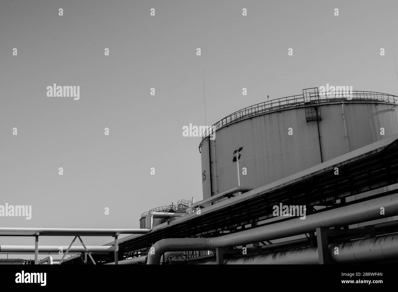 Crude oil tank in the oil refinery. Storage tanks for oil. Tanks for ...