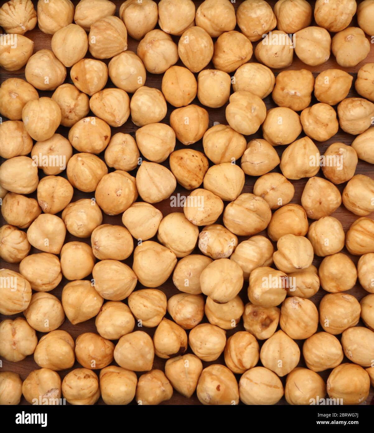 Organic roasted hazelnut. For texture or background Stock Photo - Alamy