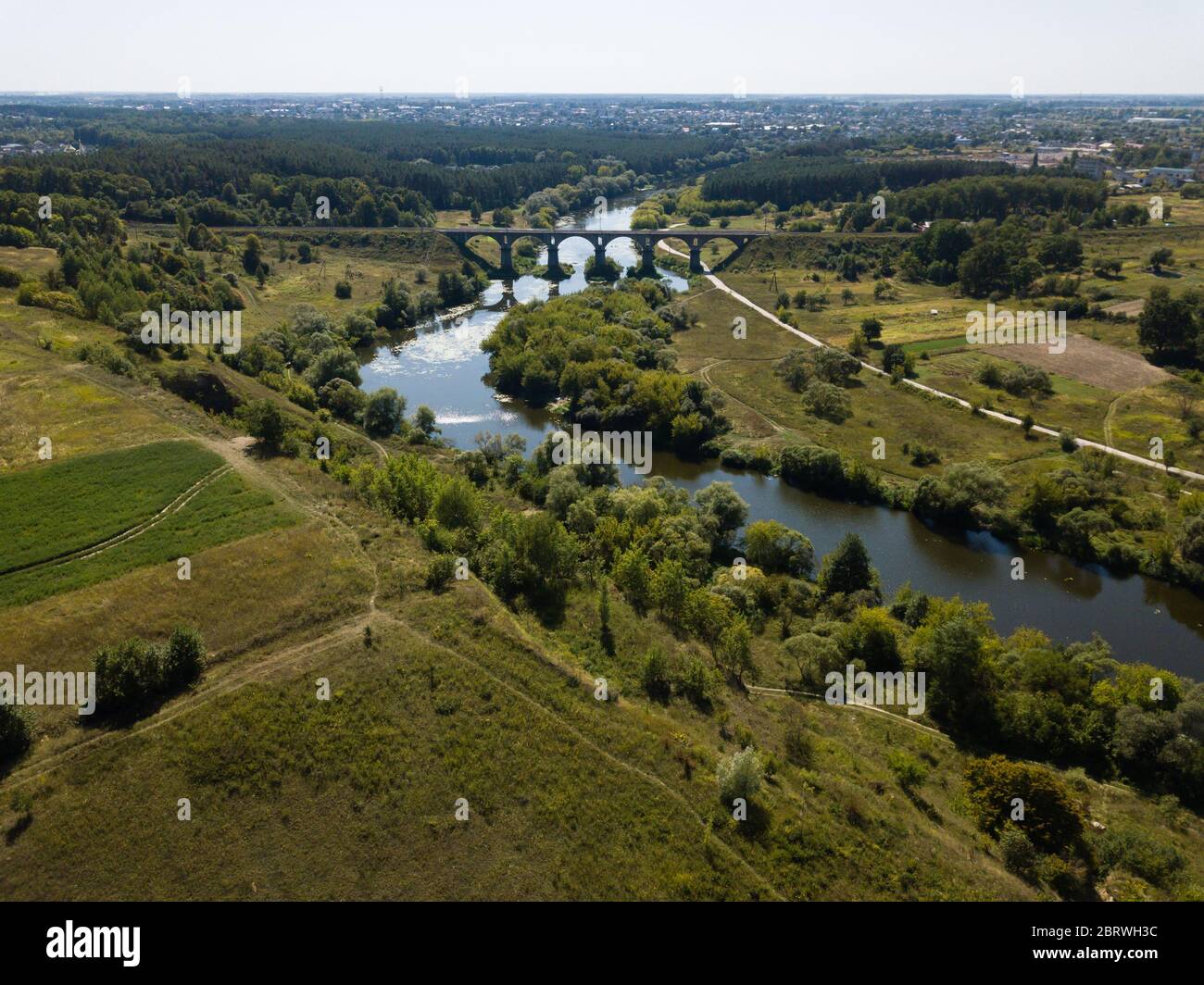 Aerila view to beautiful railway bridge viaduct over the river Sluch ...