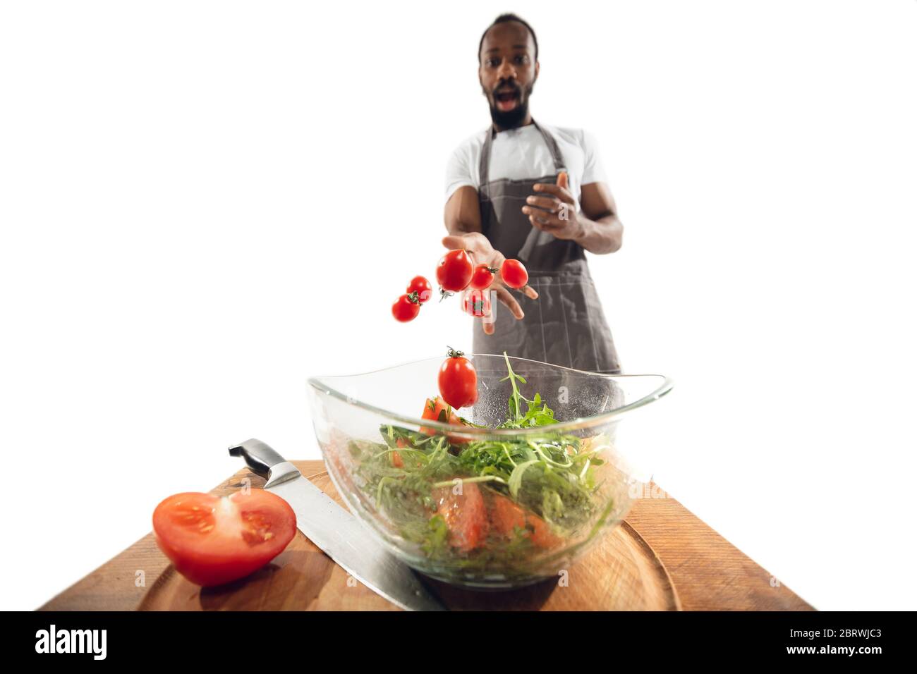 Amazing african-american man preparing unbelievable food with action ...