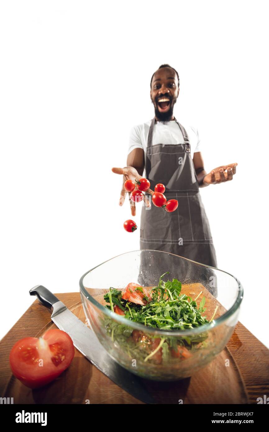 Amazing african-american man preparing unbelievable food with action ...