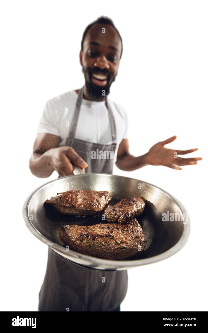 Amazing african-american man preparing unbelievable food with action ...