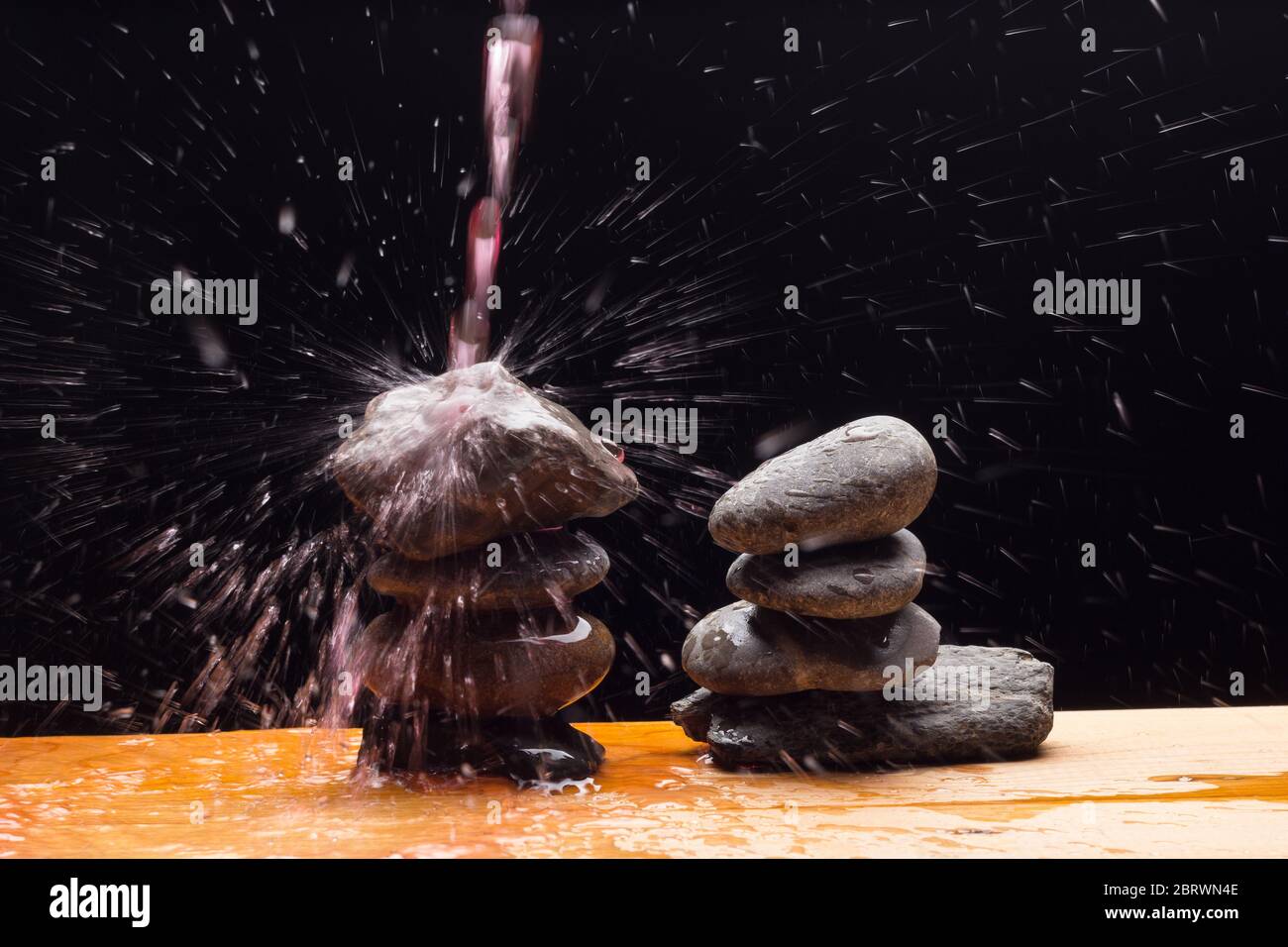 Crystal clear, drinkable and transparent water, falling on some stones ...