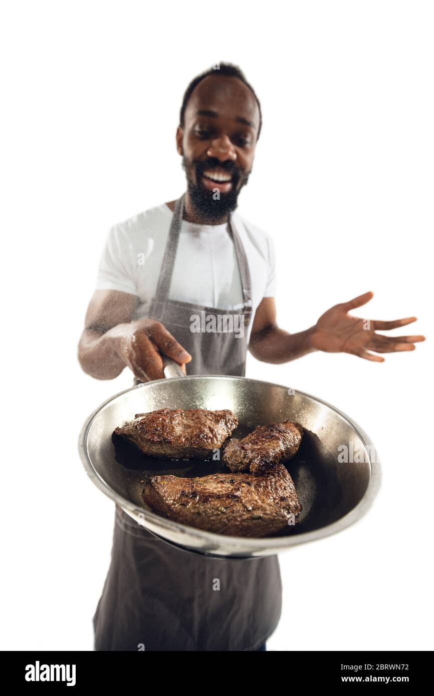Amazing african-american man preparing unbelievable food with action ...