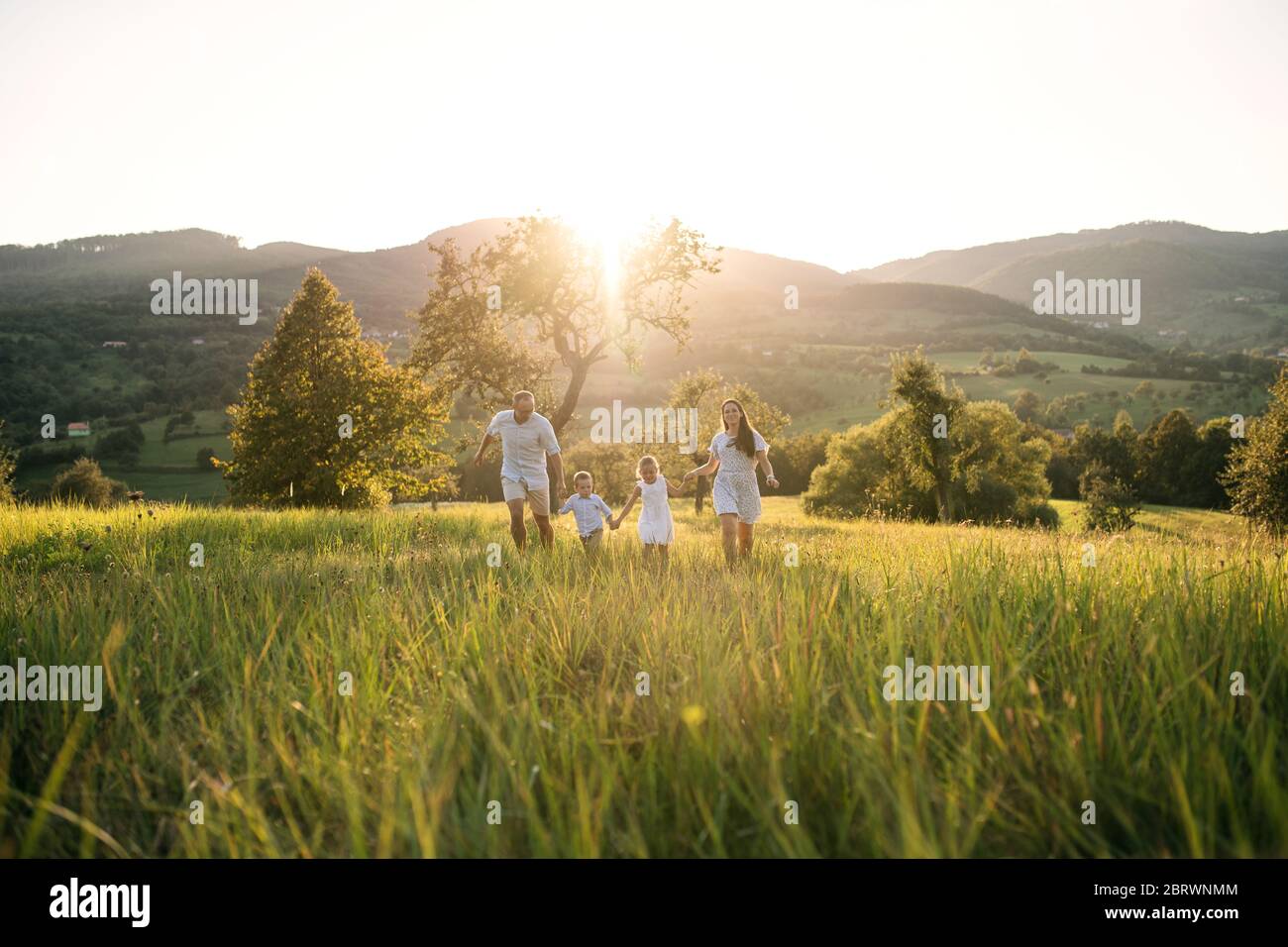 Children Holding Hands Running High Resolution Stock Photography and ...