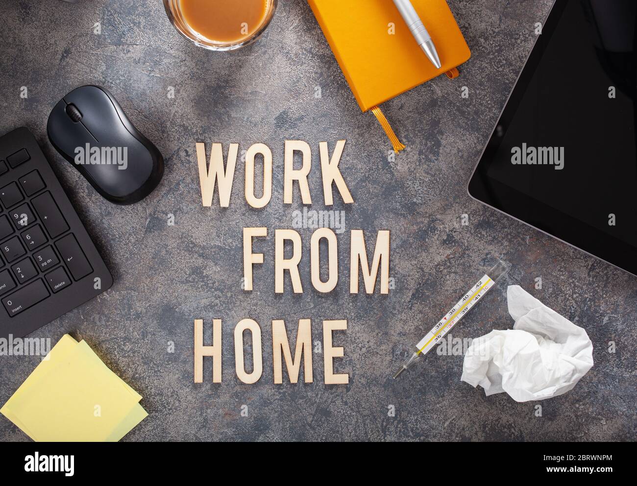 work from home text desk with keyboard computer smartphone notebook ...