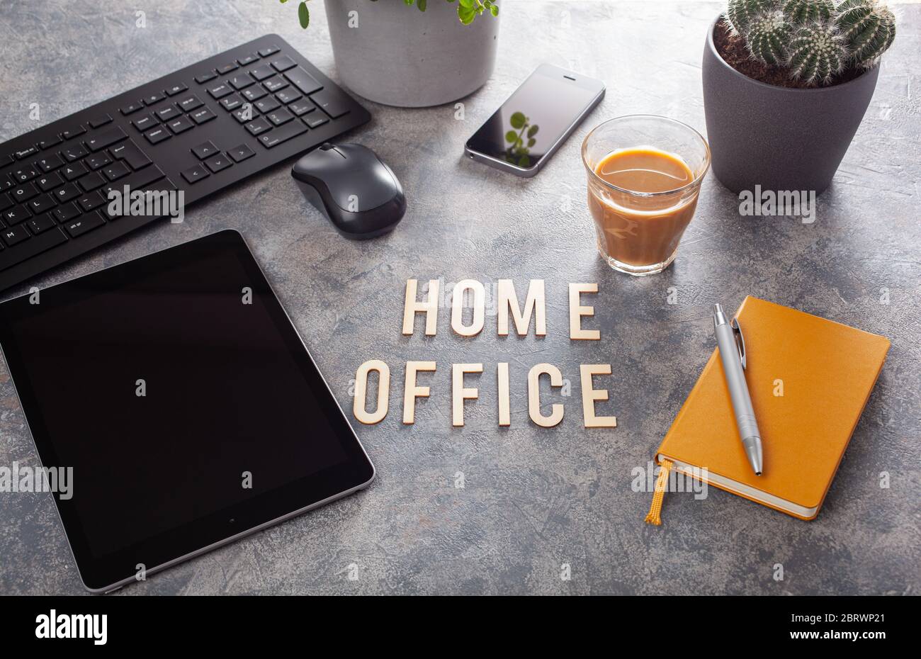 home office text desk with keyboard computer smartphone notebook ...