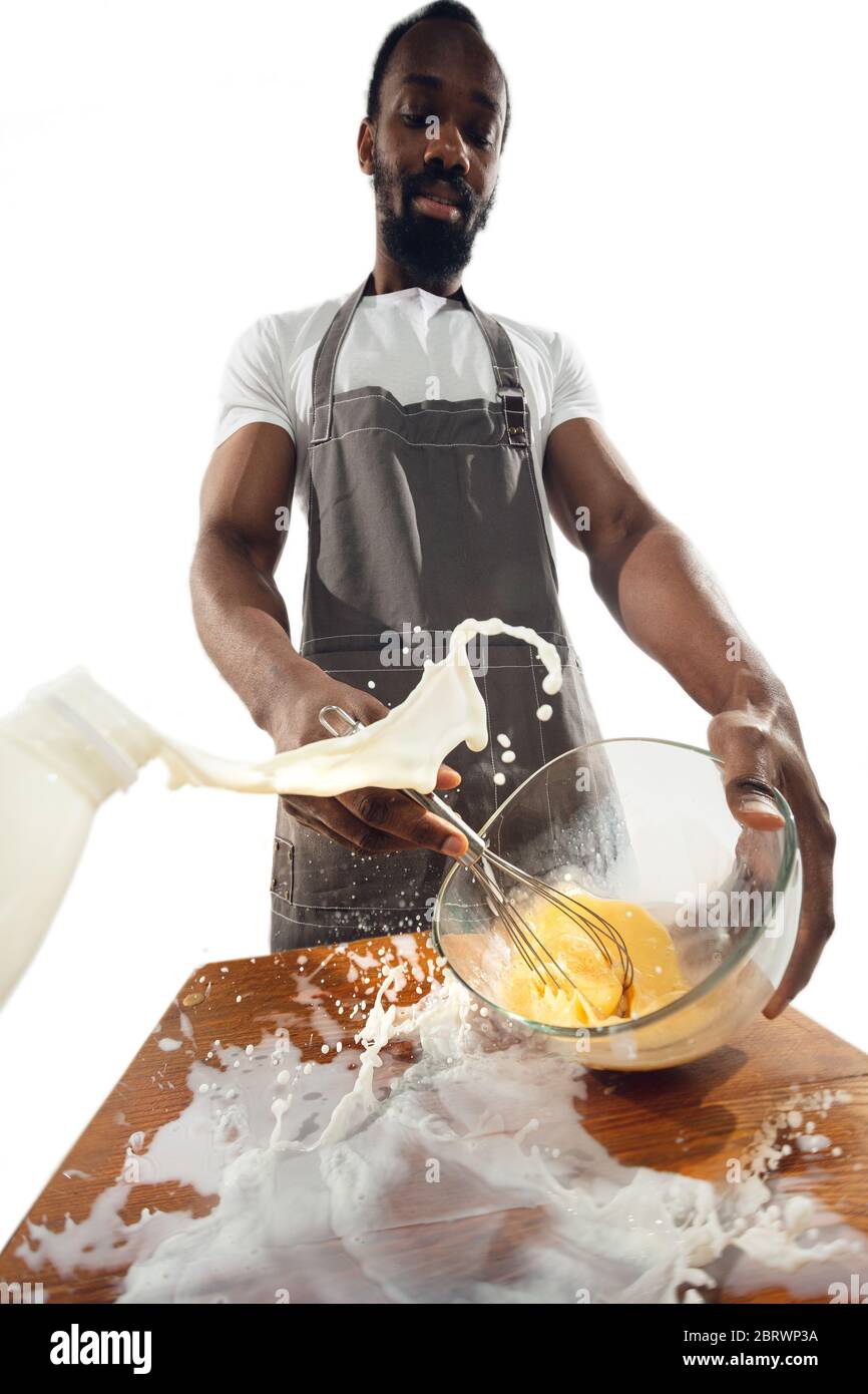 Amazing african-american man preparing unbelievable food with action ...