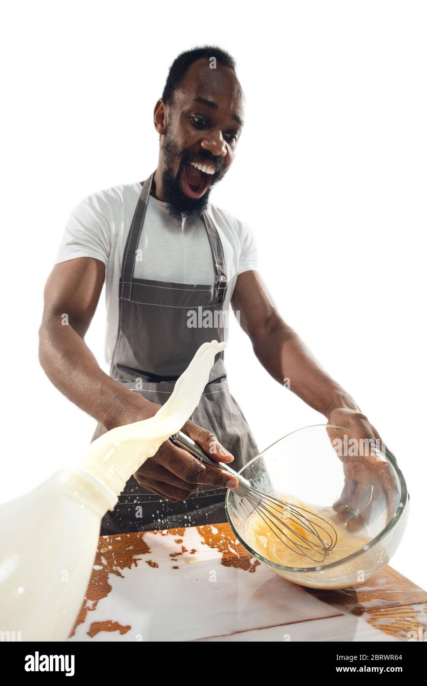 Amazing african-american man preparing unbelievable food with action ...