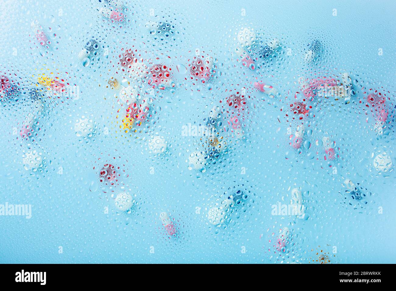 pill tablet capsule medicine through water drops background Stock Photo ...