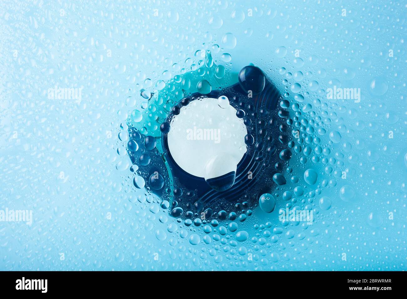 asthma inhaler medicine through water drop background. medical ...