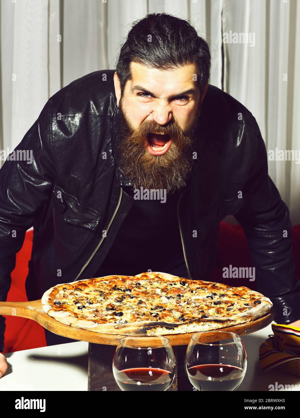 Angry bearded man or caucasian hipster with long beard and moustache in ...