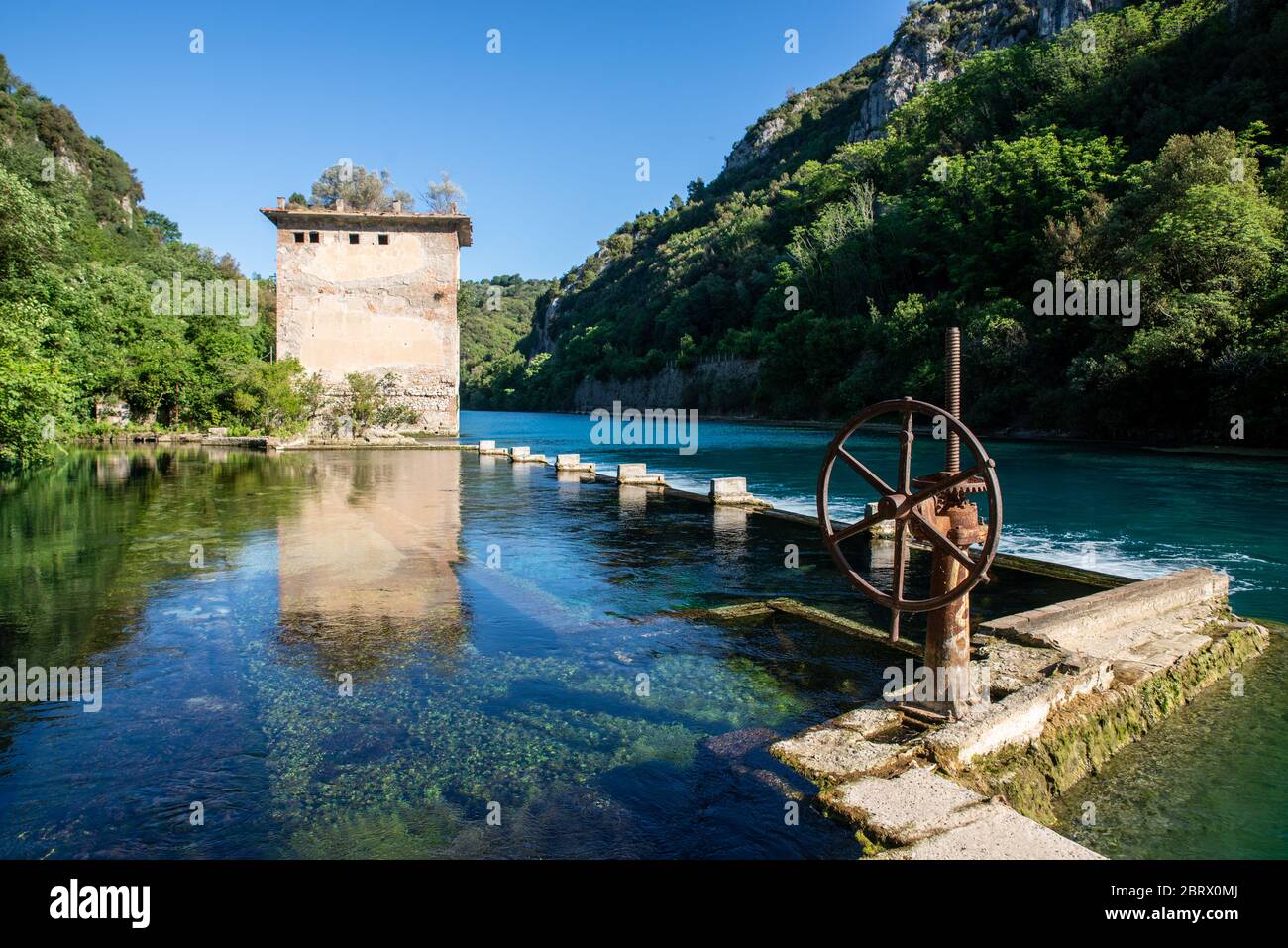 bulk of the country of a blue-watered siphon where boys bathe in the ...