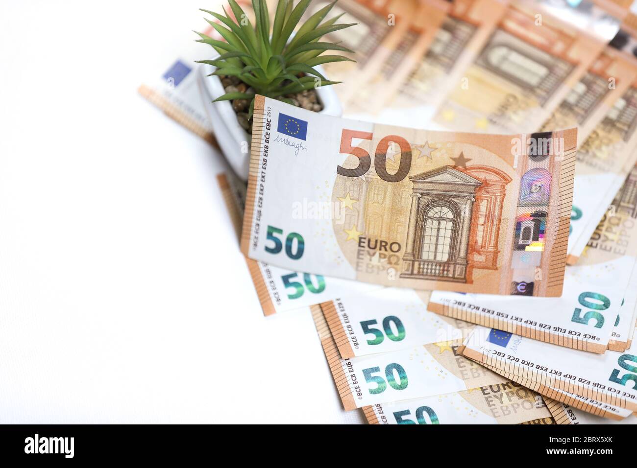 Stack of 50 euro banknotes isolated on a white background. Financial ...