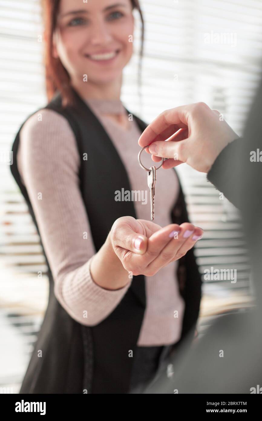 Businessman passing key hi-res stock photography and images - Alamy