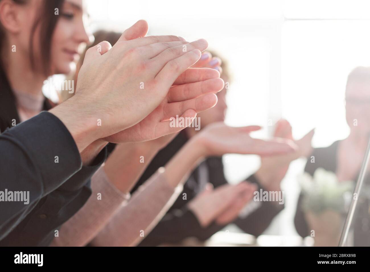 Business people clapping and applause at meeting or conference, close ...