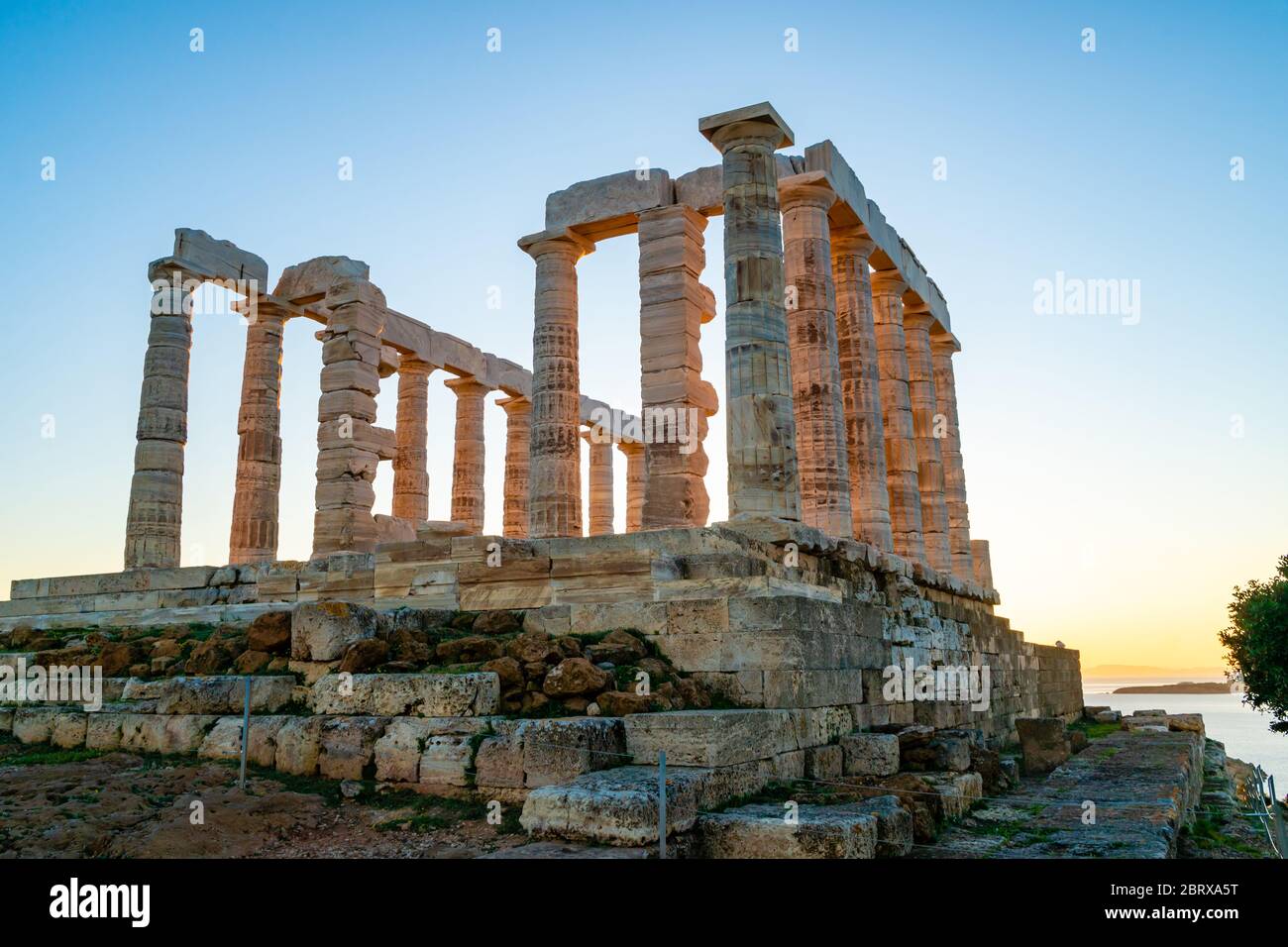 ancient columns of parthenon against blue sky Stock Photo - Alamy
