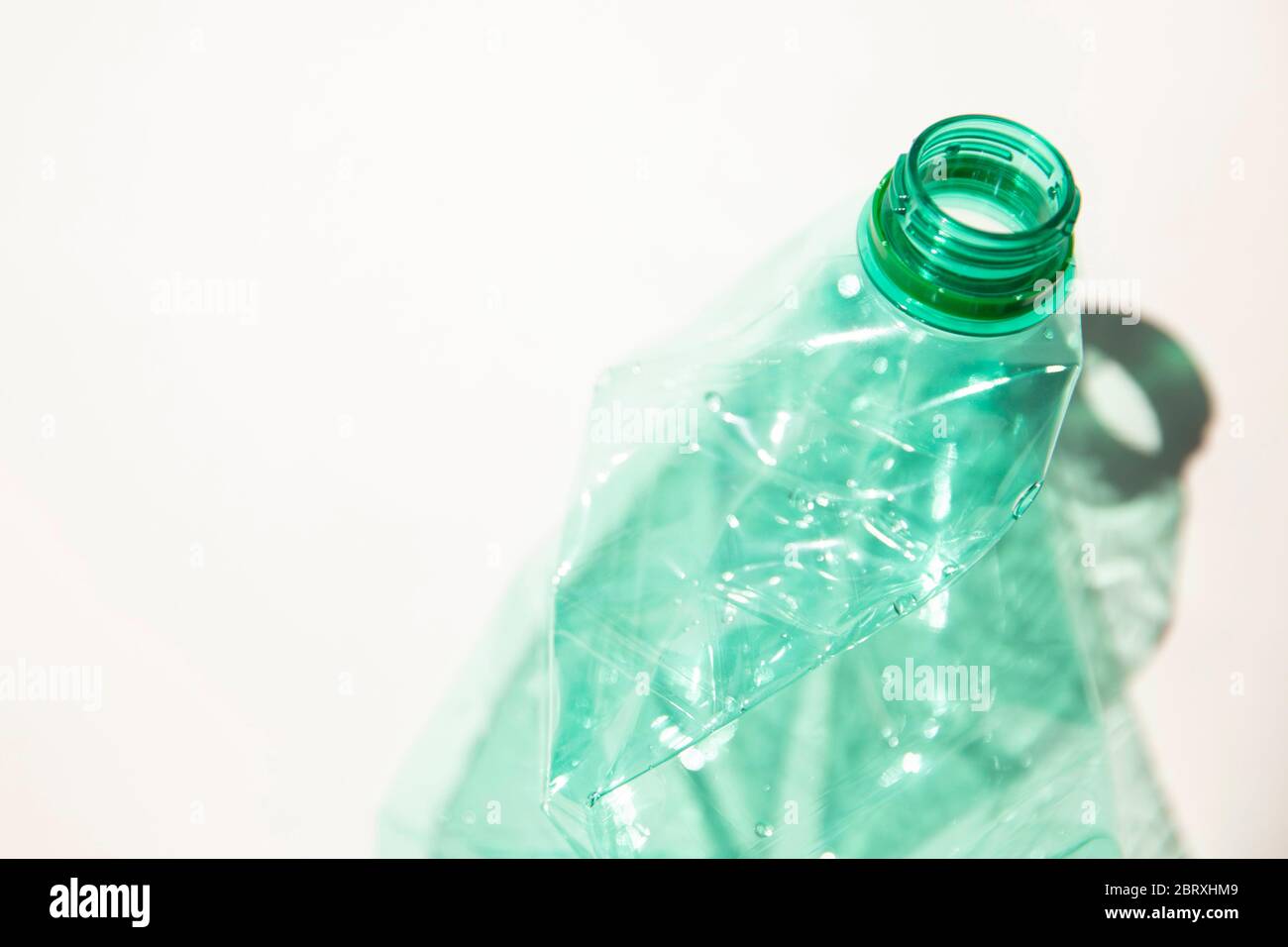 Empty green plastic waste water bottle ready to be recycled Stock Photo ...