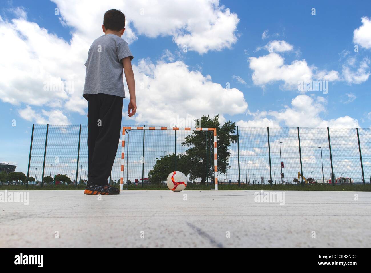 Boy shooting penalties hi-res stock photography and images - Alamy