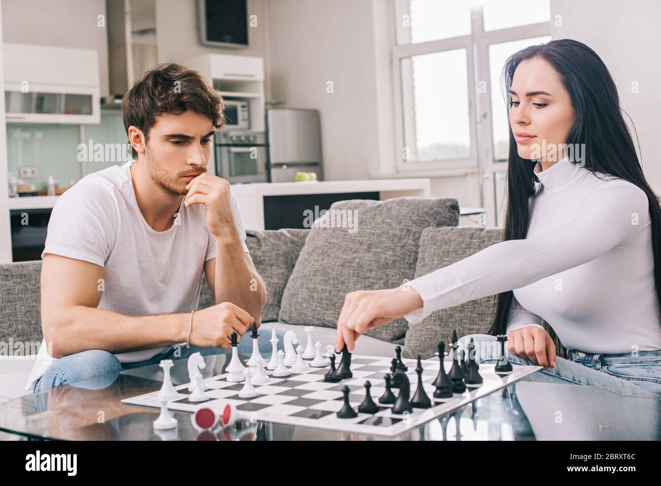 Beautiful girl playing chess hi-res stock photography and images - Alamy