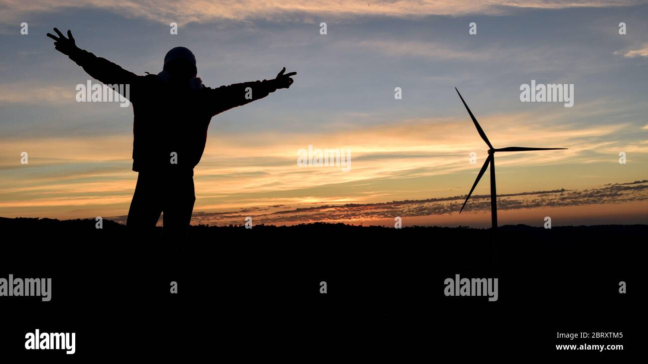 People wind energy silhouette beach hi-res stock photography and images ...