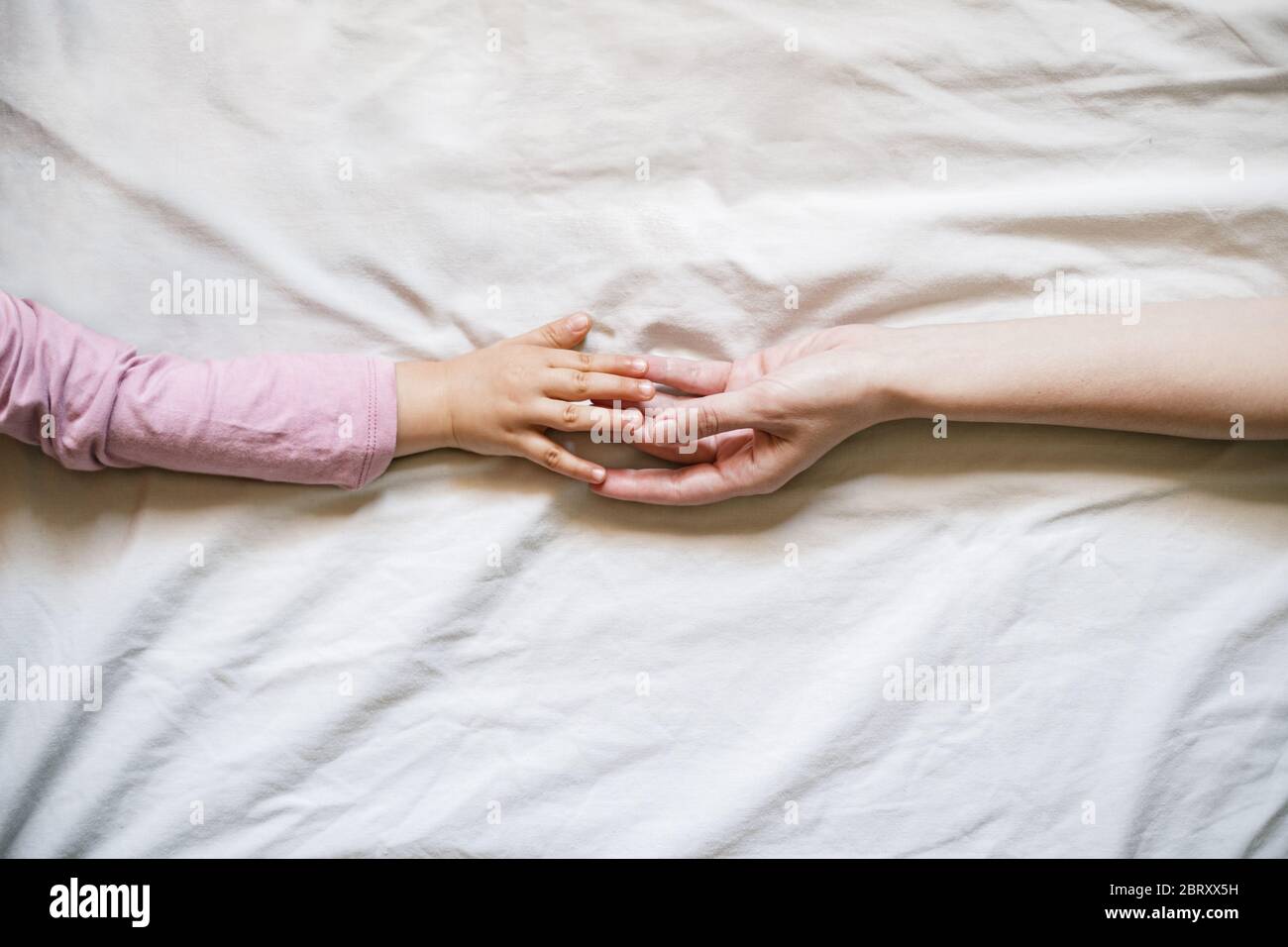 Kid reach out hand hi-res stock photography and images - Alamy