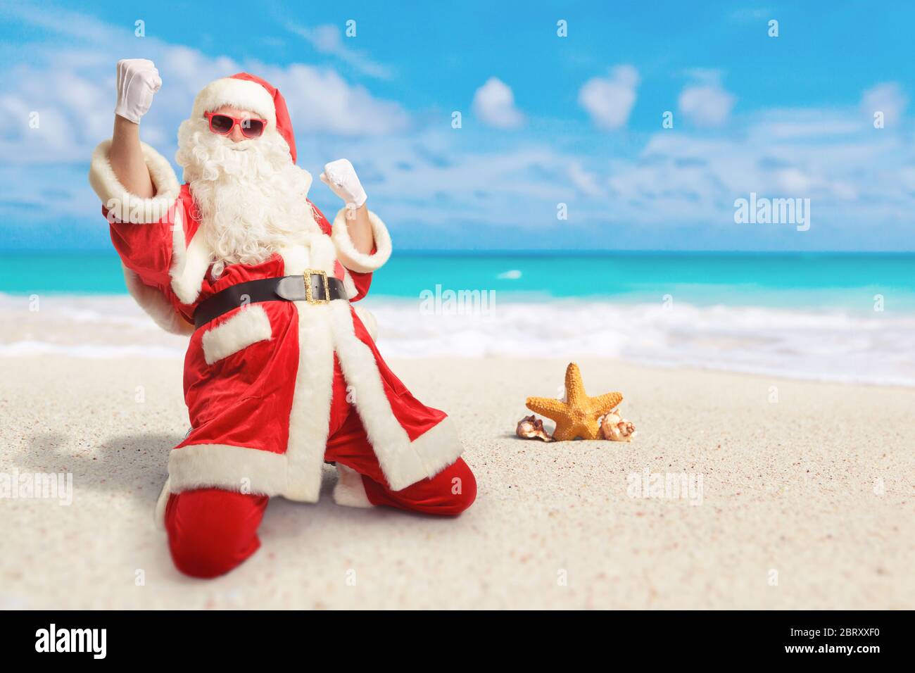 Cheerful Santa Claus is happy about his perfect sunny vacation ...