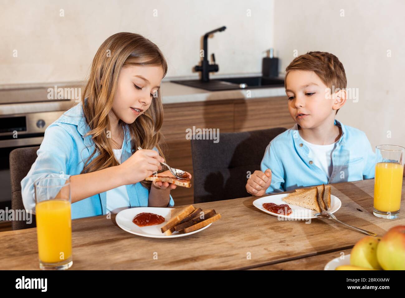 Kid making toast hi-res stock photography and images - Alamy