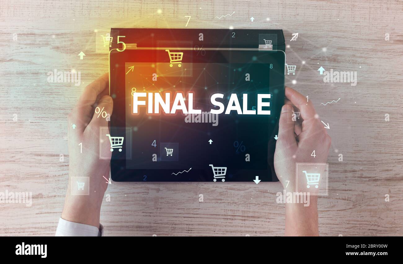 Close-up of a hand holding tablet with FINAL SALE inscription, online ...