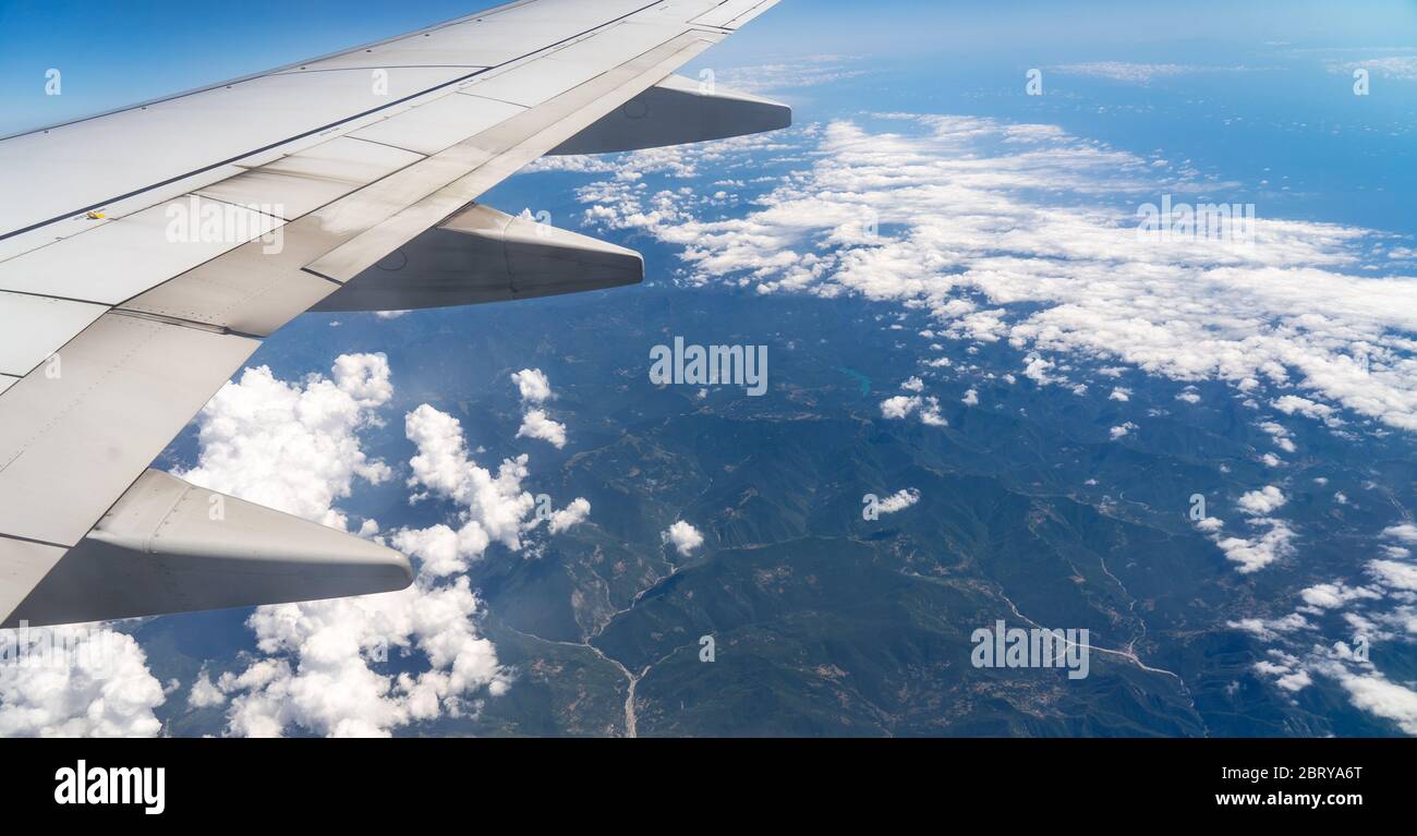 Ryanair flying and traveling, view from airplane window on the wing ...