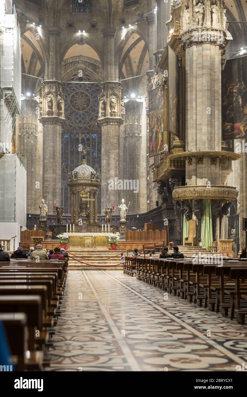 Aisle of the Milan Cathedral: Religious Theme Stock Photo - Alamy