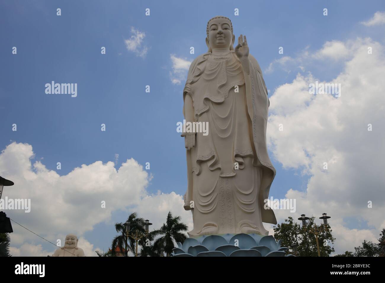 Giant Standing Buddha in Vietnam Stock Photo - Alamy