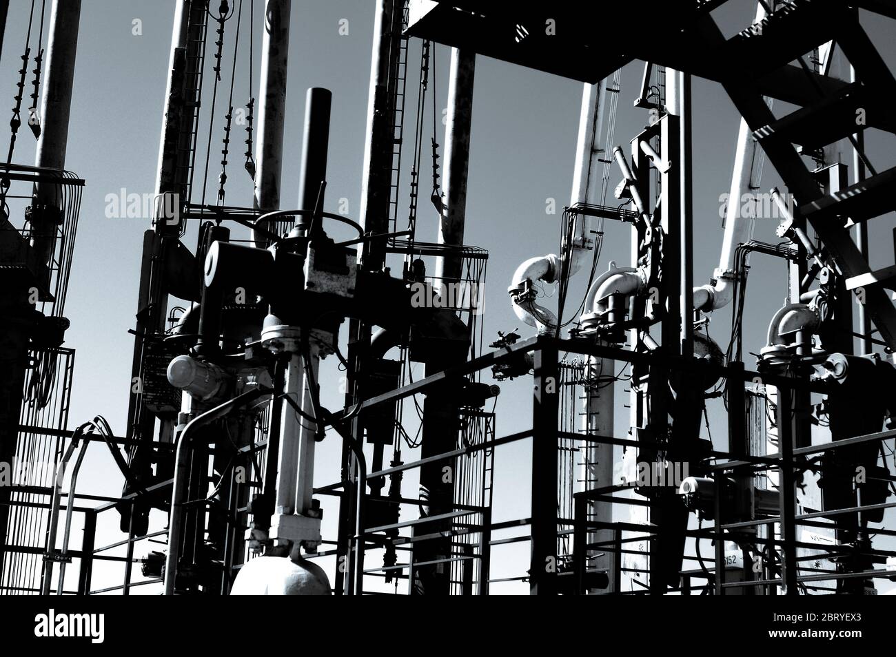 The equipment of oil refining. Industrial zone. Factory equipment ...