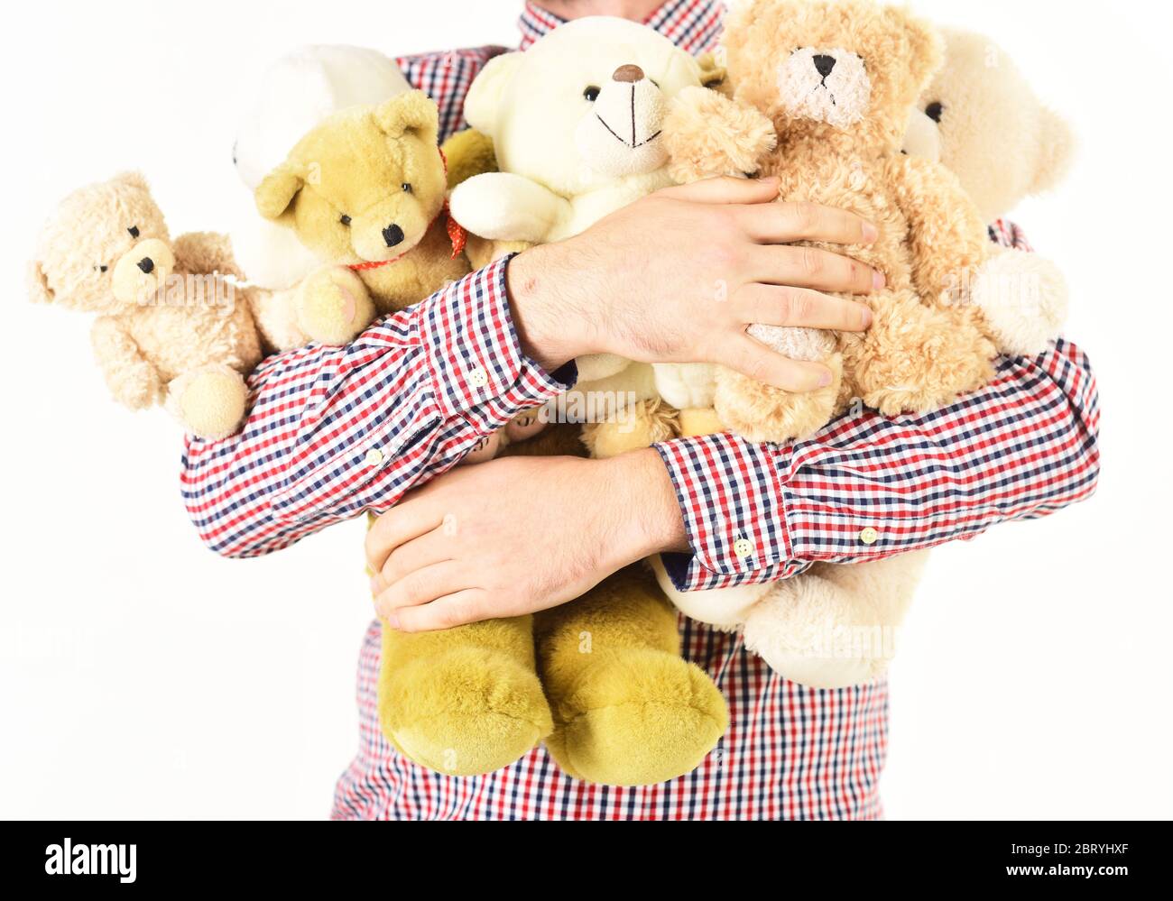 Teddy bears or plush toys in mans hands. Pile of soft toys in male ...