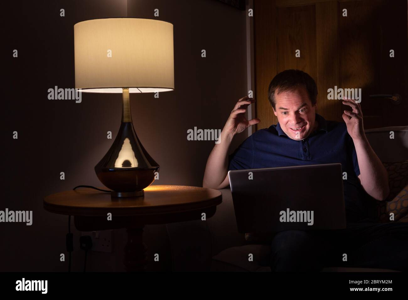 Man under pressure and stressed while working from home, troubled man ...