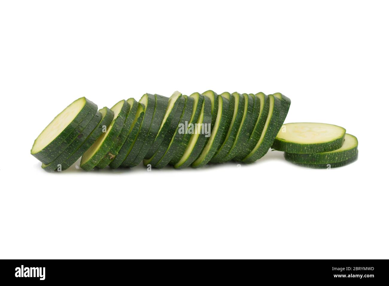 green courgette cut in many slices Stock Photo - Alamy