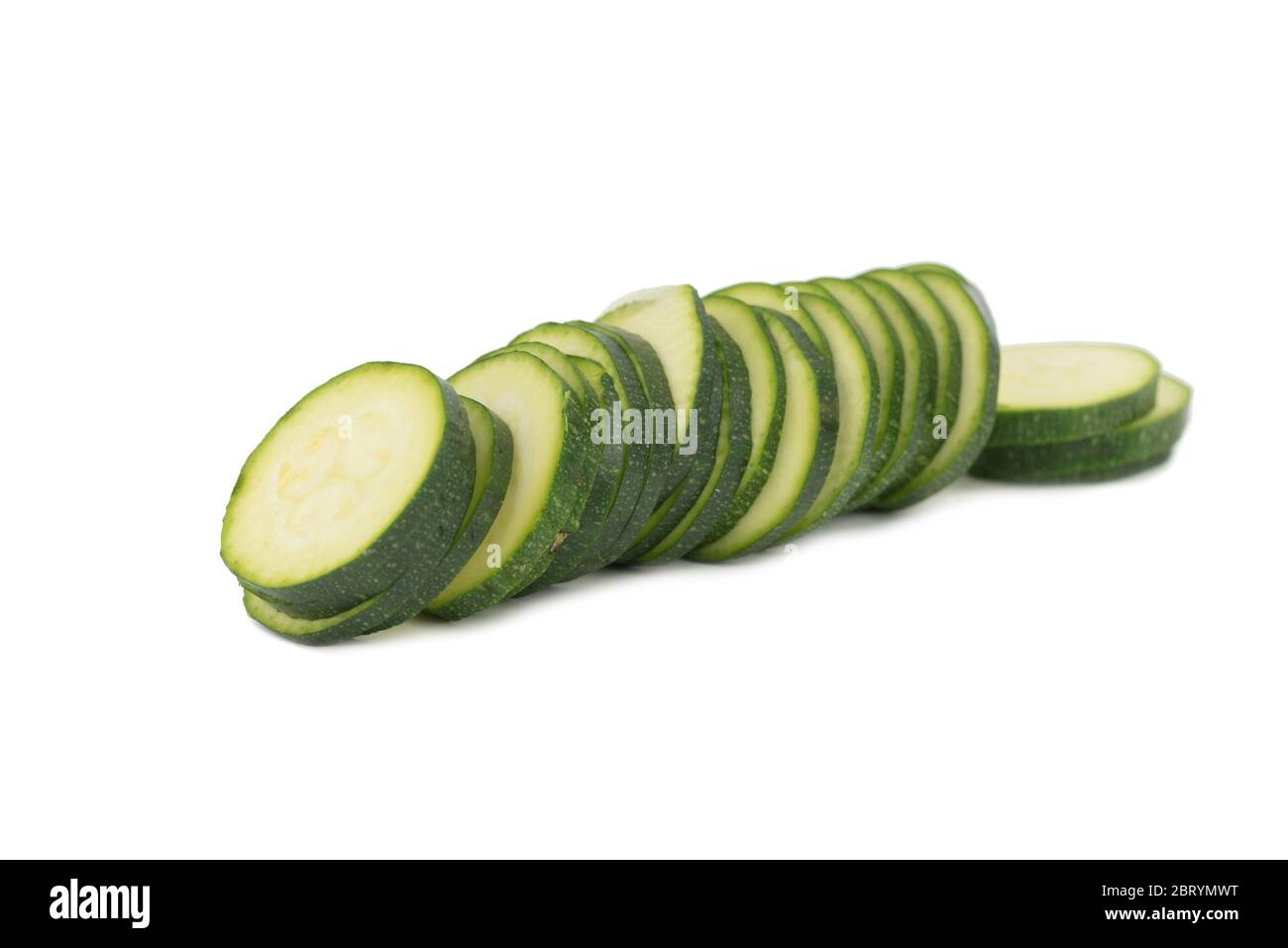 green courgette cut in many slices Stock Photo - Alamy