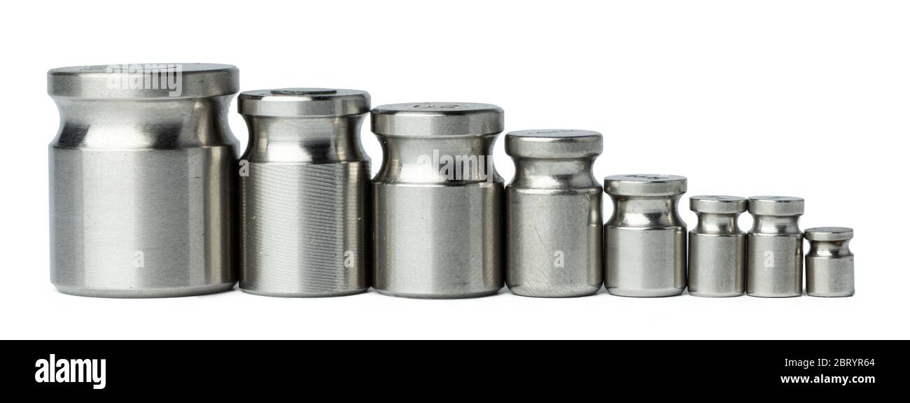 Set of metal weights for scales isolated on white Stock Photo - Alamy