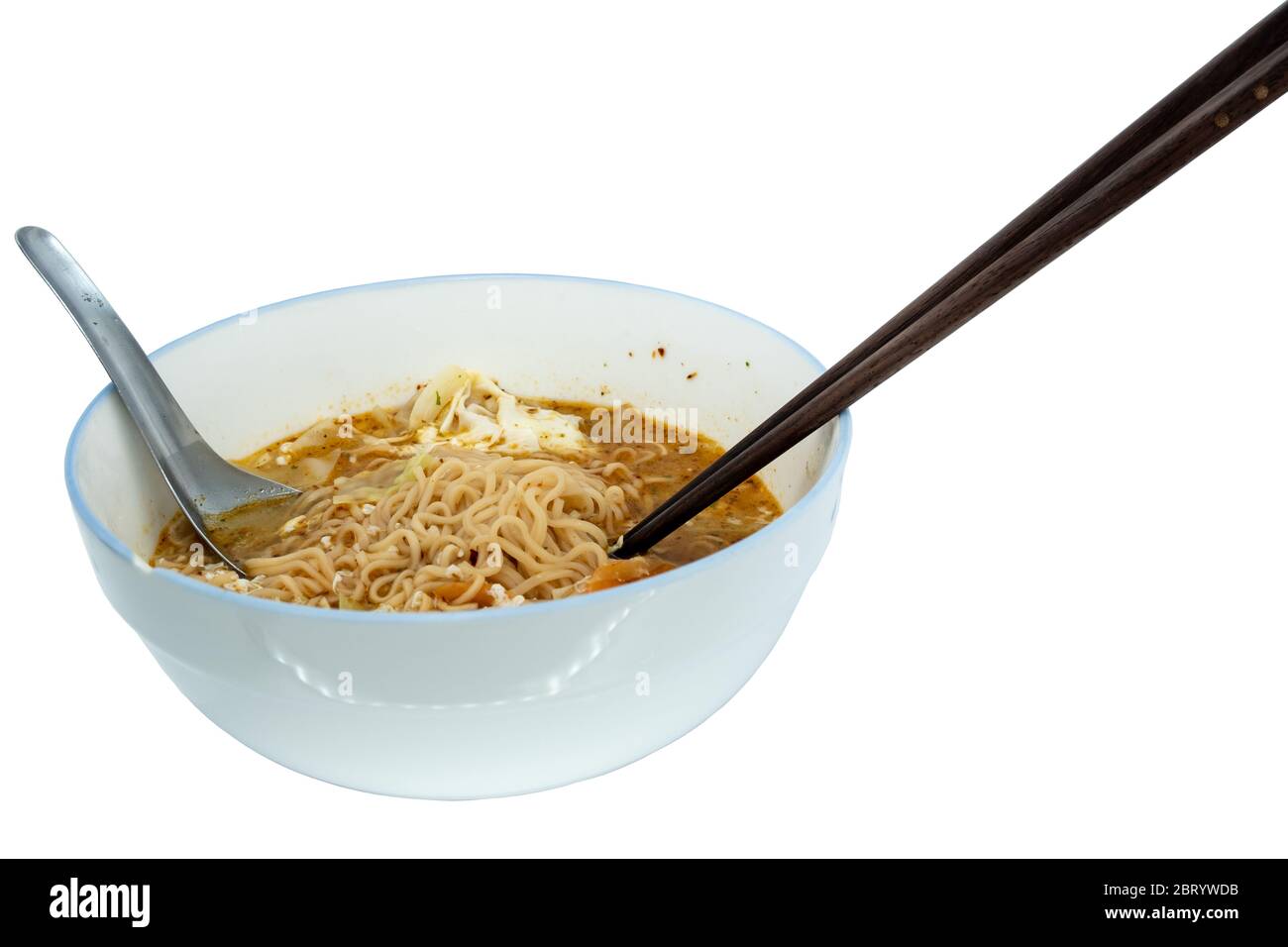 The Instant noodle with spoon and chopsticks in a white ceramic bowl ...