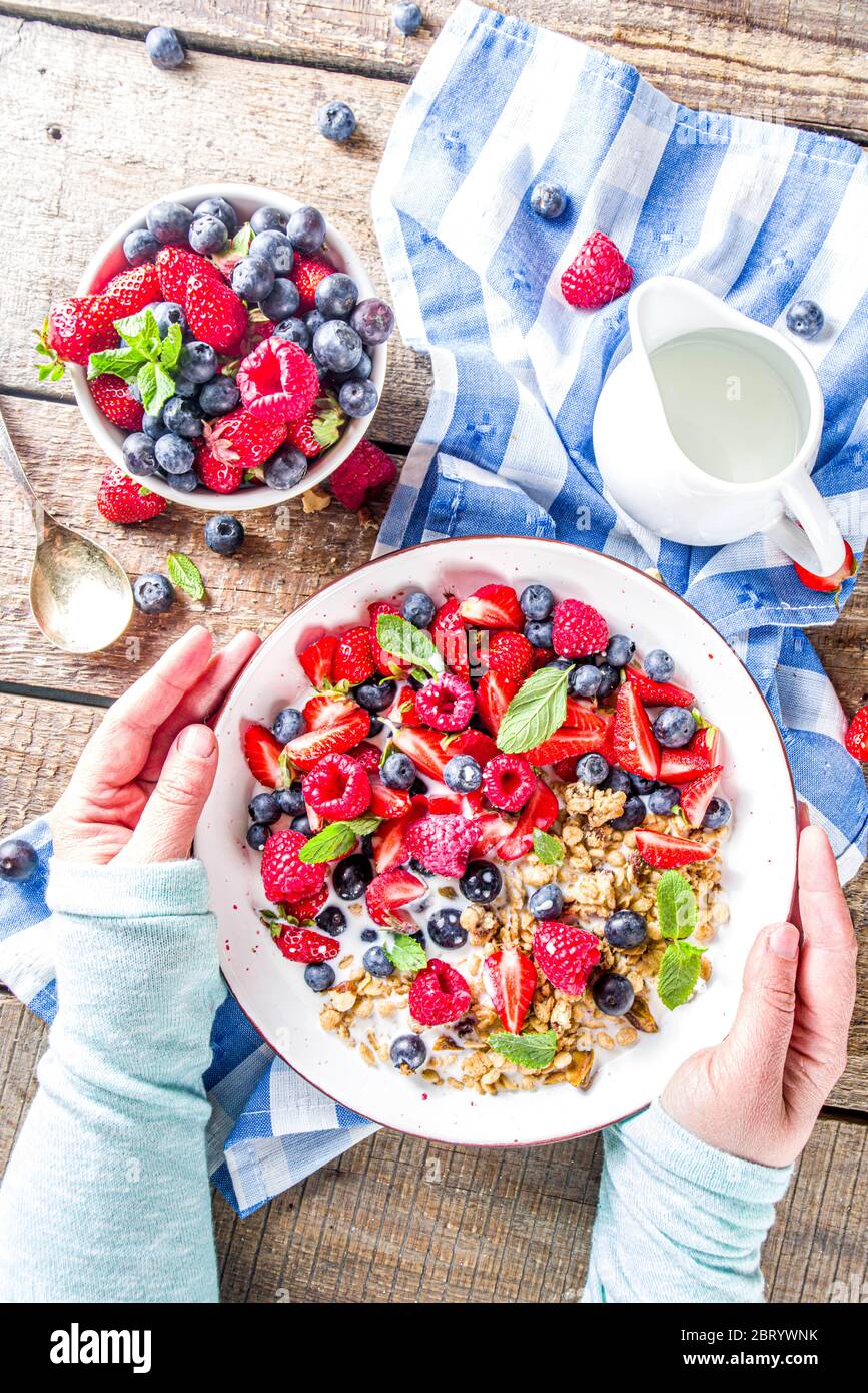 Healthy morning food, Breakfast oatmeal granola or muesli with various ...