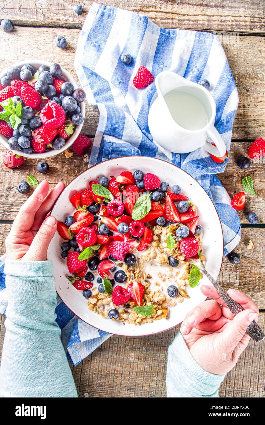 Healthy morning food, Breakfast oatmeal granola or muesli with various ...
