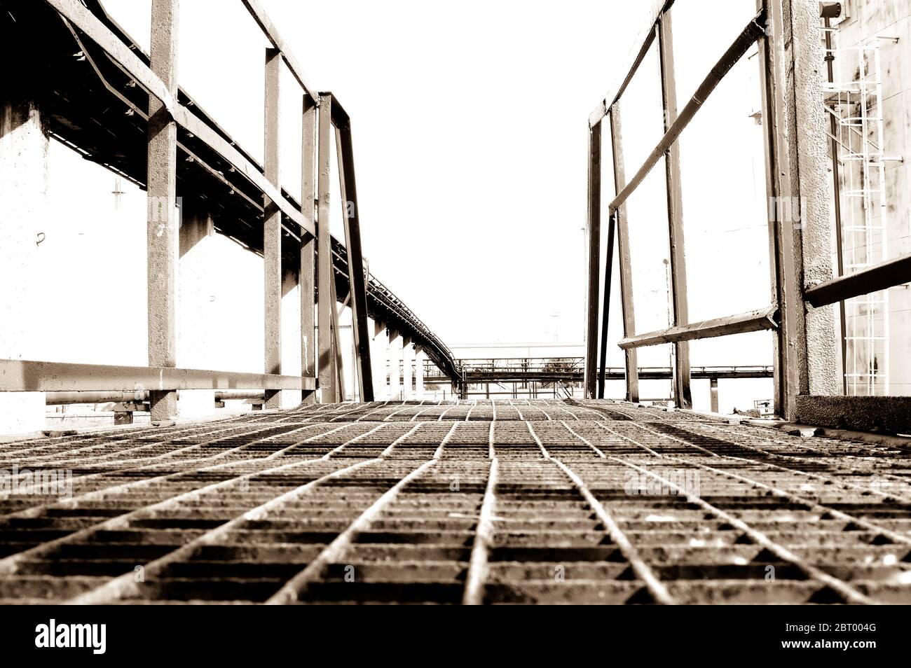 Metal industrial grid on the floor. Metal handrails Stock Photo - Alamy