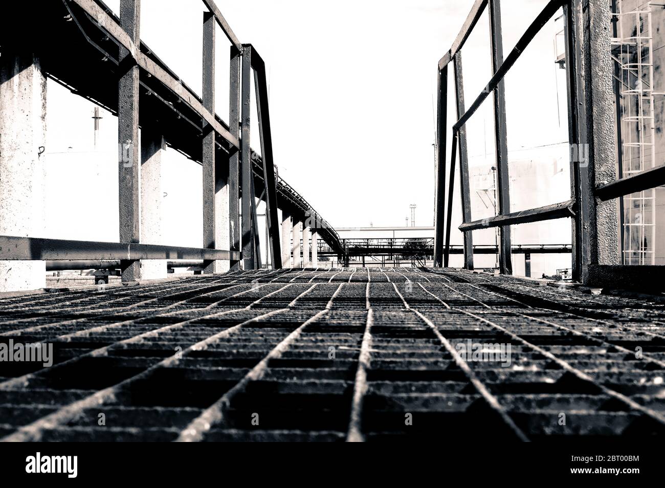 Metal industrial grid on the floor. Metal handrails Stock Photo - Alamy