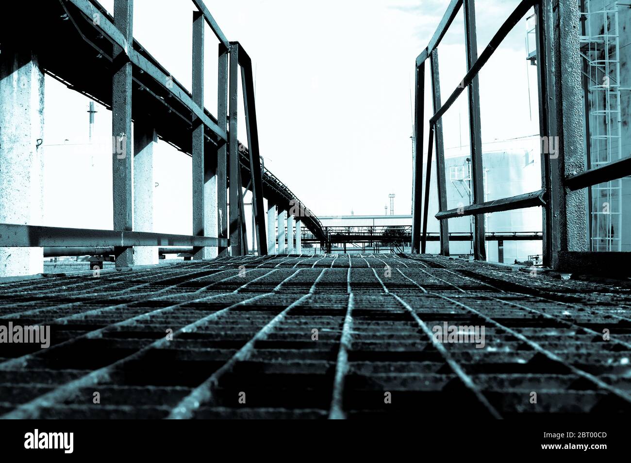 Metal industrial grid on the floor. Metal handrails Stock Photo - Alamy