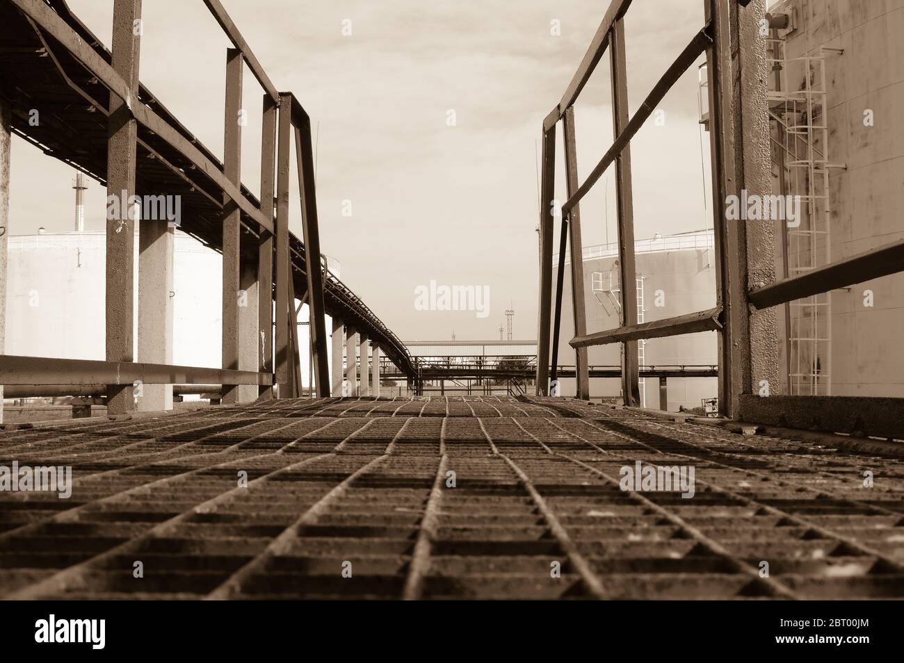 Metal industrial grid on the floor. Metal handrails Stock Photo - Alamy