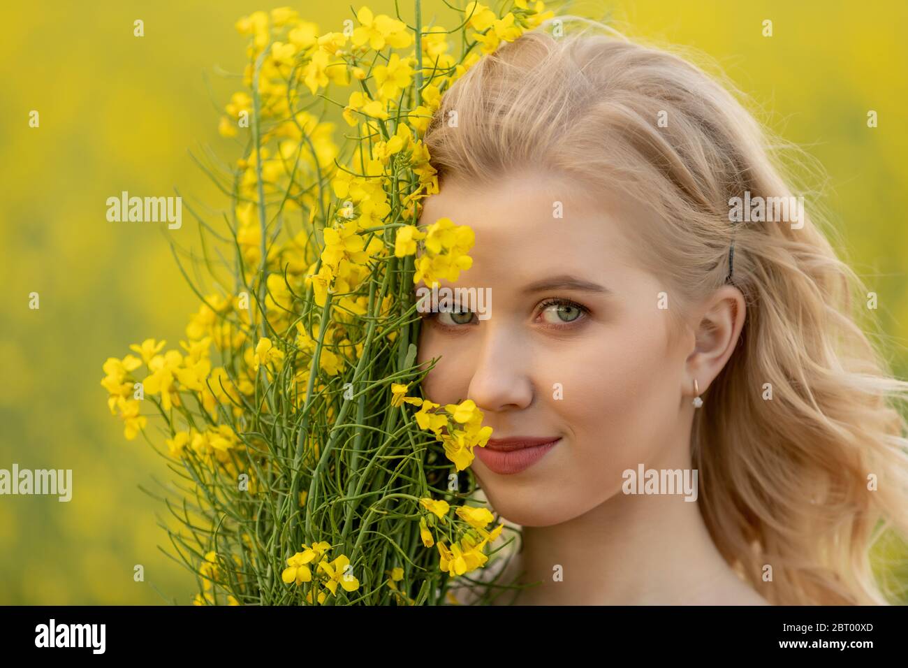Portrait beautiful blonde girl sunflower hi-res stock photography and ...